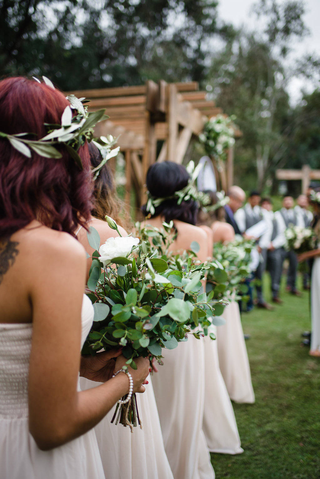 A romantic garden ceremony with a uniformed groom and boho bride ...